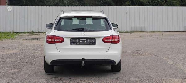 White Mercedes-Benz C 200 2016 in Utena, with an engine capacity of 1.60 L and mileage of 302 thousand km for 7650 €, photo 2 on AUTOMOTO.COM.LV