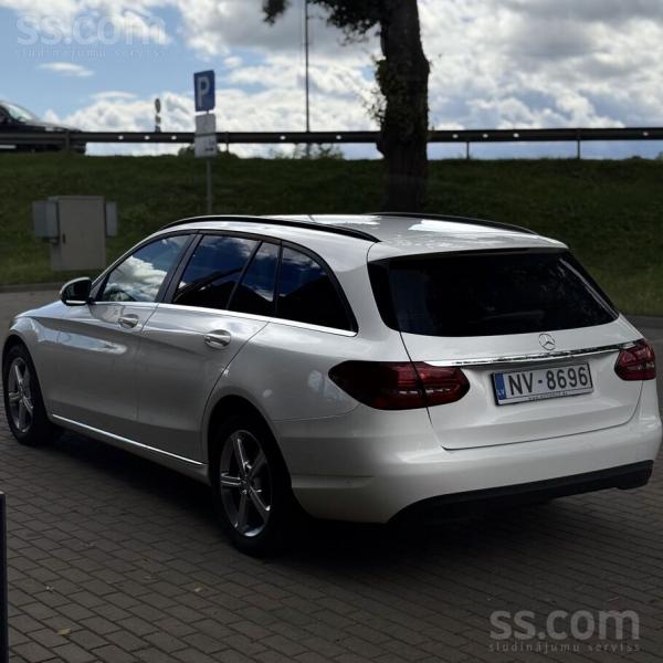 White Mercedes-Benz C 200 2019 in Daugavpils, with an engine capacity of 1.60 L and mileage of 255 thousand km for 16700 €, photo 4 on AUTOMOTO.COM.LV