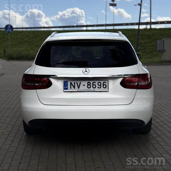 White Mercedes-Benz C 200 2019 in Daugavpils, with an engine capacity of 1.60 L and mileage of 255 thousand km for 16700 €, photo 5 on AUTOMOTO.COM.LV