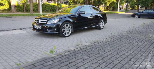 Black Mercedes-Benz c-220 2011 in Siauliai, with an engine capacity of 2.20 L and mileage of 340 thousand km for 6350 €, photo 1 on AUTOMOTO.COM.LV