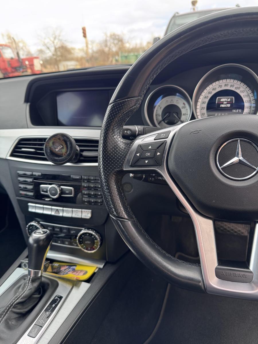 Black Mercedes-Benz c-220 2015 in Balvi, with an engine capacity of 2.20 L and mileage of 152 thousand km for 4000 €, photo 12 on AUTOMOTO.COM.LV