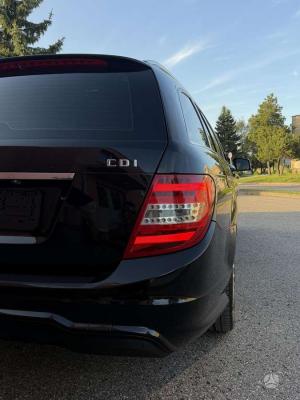 Black Mercedes-Benz c-220 2012 in Utena, with an engine capacity of 2.14 L and mileage of 332 thousand km for 5990 €, photo 16 on AUTOMOTO.COM.LV
