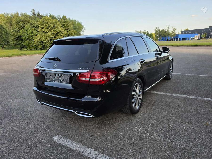 Black Mercedes-Benz c-220 2014 in Kaunas, with an engine capacity of 2.20 L and mileage of 243 thousand km for 11950 €, photo 6 on AUTOMOTO.COM.LV