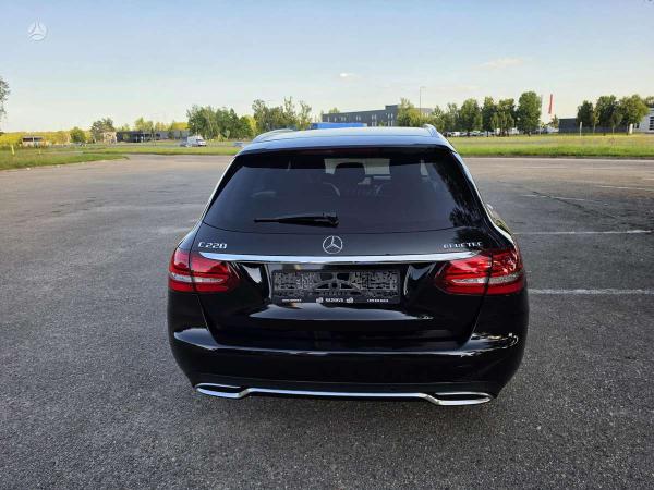Black Mercedes-Benz c-220 2014 in Kaunas, with an engine capacity of 2.20 L and mileage of 243 thousand km for 11950 €, photo 6 on AUTOMOTO.COM.LV