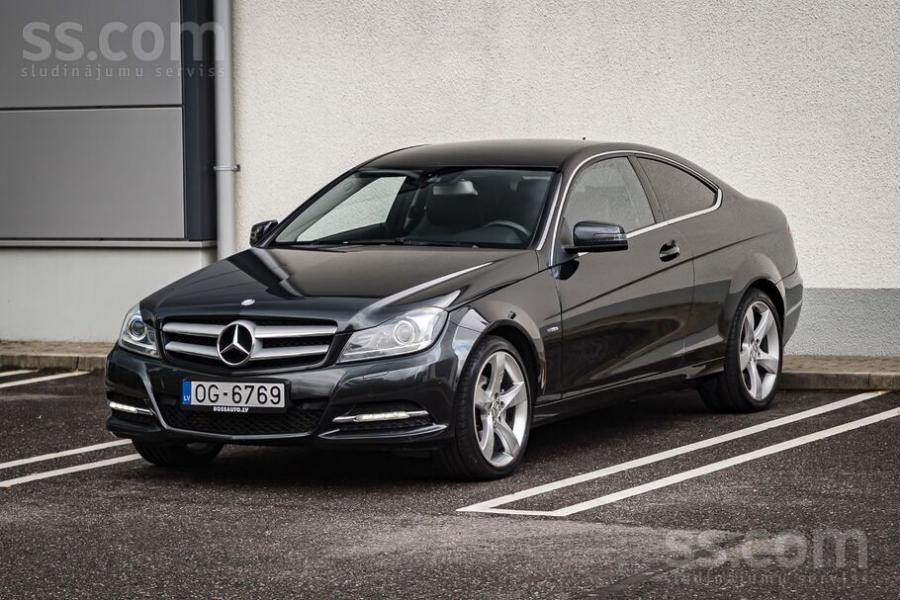 Black Mercedes-Benz C 250 2011 in Riga, with an engine capacity of 2.20 L and mileage of 238 thousand km for 9950 €, photo 1 on AUTOMOTO.COM.LV