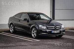 Black Mercedes-Benz C 250 2011 in Riga, with an engine capacity of 2.20 L and mileage of 238 thousand km for 9950 €, photo 4 on AUTOMOTO.COM.LV