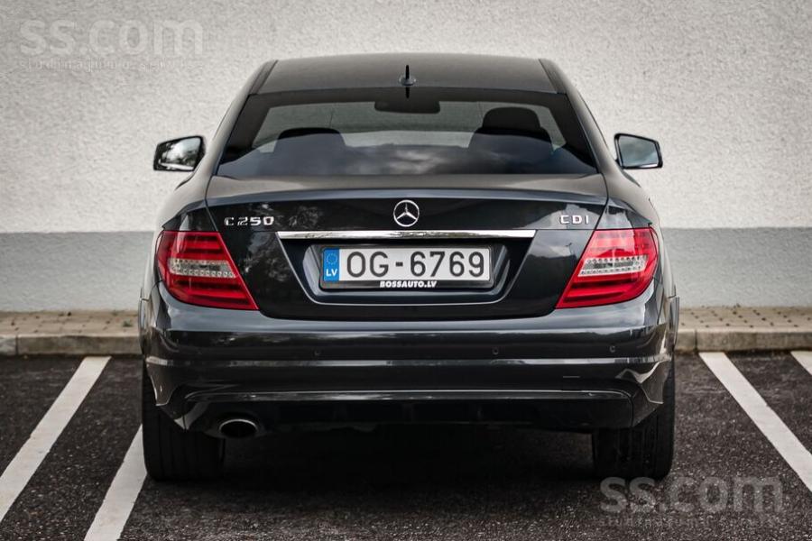 Black Mercedes-Benz C 250 2011 in Riga, with an engine capacity of 2.20 L and mileage of 238 thousand km for 9950 €, photo 6 on AUTOMOTO.COM.LV