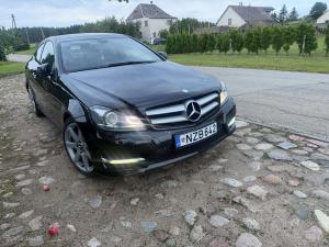 Black Mercedes-Benz C 250 2014 in Vilnius, with an engine capacity of 2.10 L and mileage of 353 thousand km for 6150 €, photo  on AUTOMOTO.COM.LV