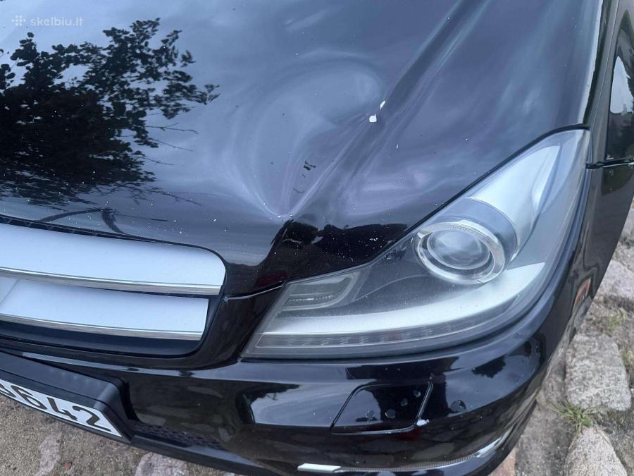 Black Mercedes-Benz C 250 2014 in Vilnius, with an engine capacity of 2.10 L and mileage of 353 thousand km for 6150 €, photo 8 on AUTOMOTO.COM.LV