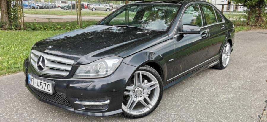 Black Mercedes-Benz C 250 2012 in Riga, with an engine capacity of 2.20 L and mileage of 210 thousand km for 9500 €, photo 1 on AUTOMOTO.COM.LV