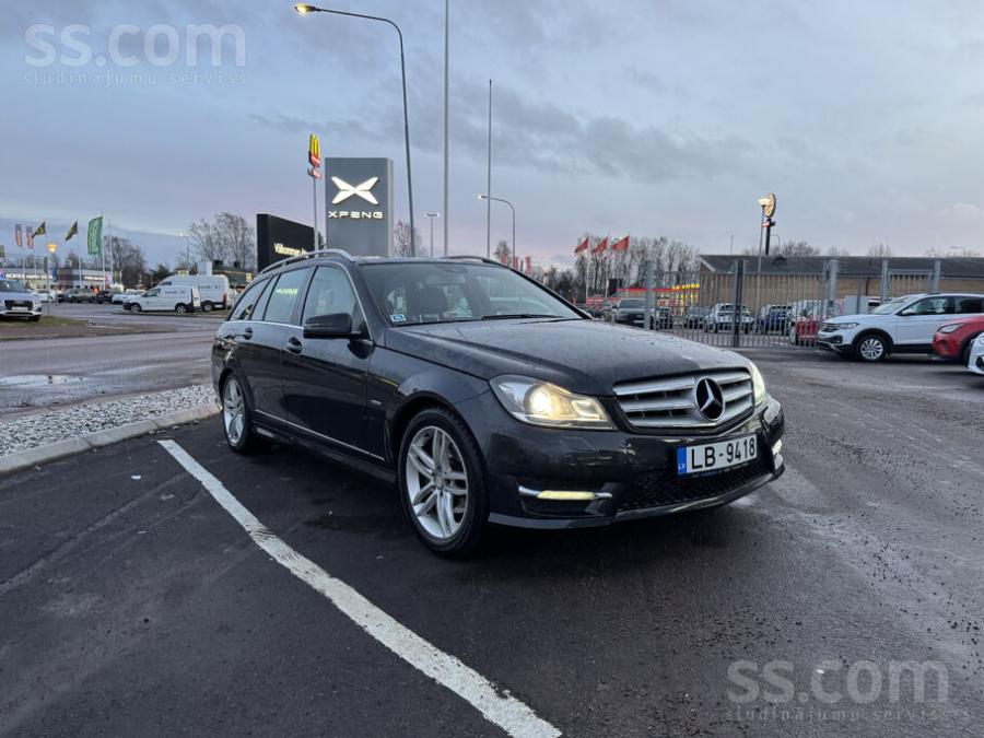 Black Mercedes-Benz C 250 2012 in Riga, with an engine capacity of 2.20 L and mileage of 264 thousand km for 6990 €, photo 3 on AUTOMOTO.COM.LV