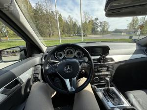 Black Mercedes-Benz C 250 2012 in Riga, with an engine capacity of 2.20 L and mileage of 264 thousand km for 6990 €, photo 11 on AUTOMOTO.COM.LV