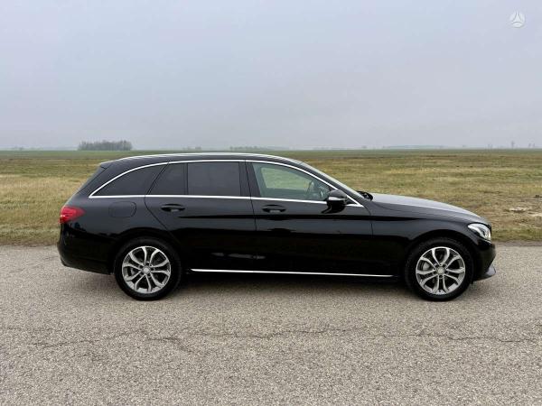 Black Mercedes-Benz C 250 2015 in Vilkaviskis, with an engine capacity of 2.14 L and mileage of 243 thousand km for 13300 €, photo 5 on AUTOMOTO.COM.LV