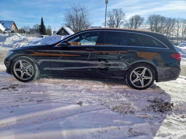 Black Mercedes-Benz C 250 2015 in Rietavas, with an engine capacity of 2.14 L and mileage of 255 thousand km for 15555 €, photo 5 on AUTOMOTO.COM.LV