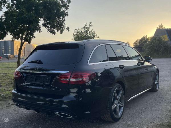 Black Mercedes-Benz C 250 2015 in Kaunas, with an engine capacity of 2.14 L and mileage of 309 thousand km for 8990 €, photo 10 on AUTOMOTO.COM.LV