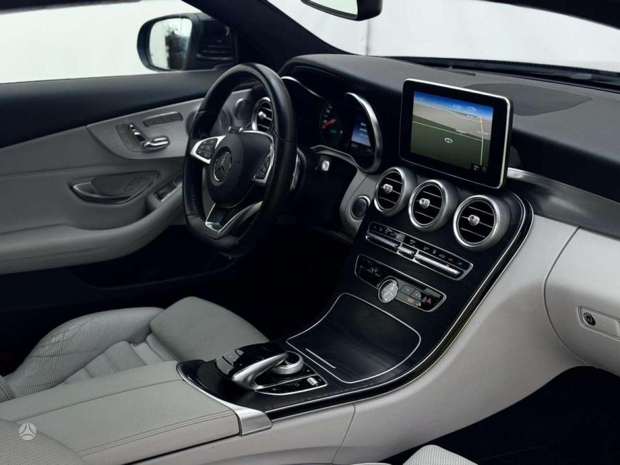 Black Mercedes-Benz C 300 2016 in Vilnius, with an engine capacity of 1.99 L and mileage of 221 thousand km for 19800 €, photo 16 on AUTOMOTO.COM.LV