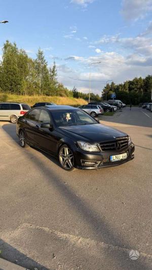 Black Mercedes-Benz C 300 2013 in Vilnius, with an engine capacity of 3.50 L and mileage of 222 thousand km for 8500 €, photo  on AUTOMOTO.COM.LV
