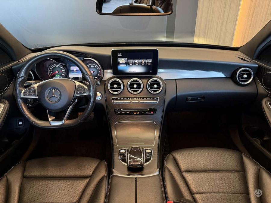 Black Mercedes-Benz C 300 2015 in Kaunas, with an engine capacity of 1.99 L and mileage of 183 thousand km for 13990 €, photo 17 on AUTOMOTO.COM.LV