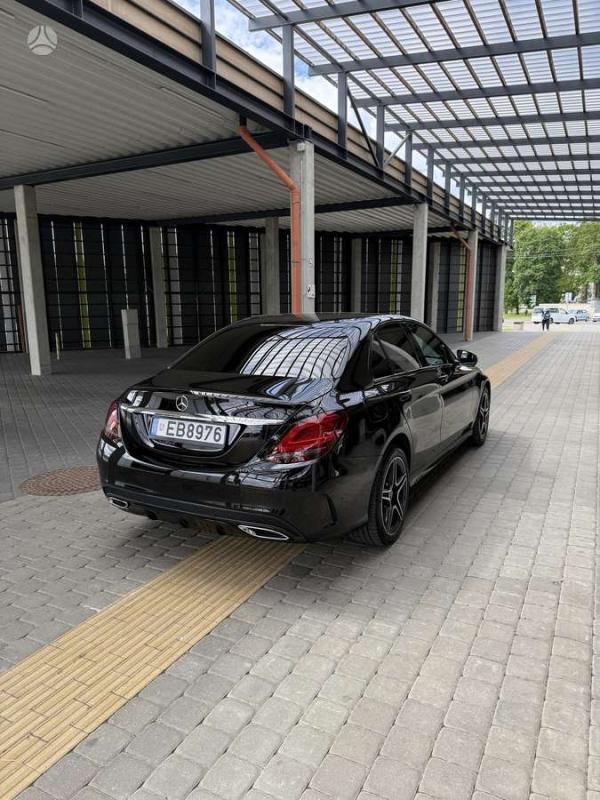 Black Mercedes-Benz C 300 2022 in Kaunas, with an engine capacity of 1.95 L and mileage of 84 thousand km for 25000 €, photo 5 on AUTOMOTO.COM.LV