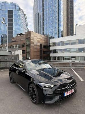 Black Mercedes-Benz C 300 2022 in Vilnius, with an engine capacity of 2.00 L and mileage of 137 thousand km for 36000 €, photo 4 on AUTOMOTO.COM.LV