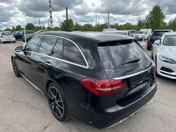 Black Mercedes-Benz C 300 2018 in Panevezys, with an engine capacity of 2.00 L and mileage of 228 thousand km for 19999 €, photo 5 on AUTOMOTO.COM.LV