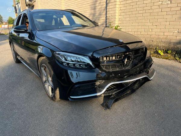 Black Mercedes-Benz C 300 2019 in Panevezys, with an engine capacity of 1.95 L and mileage of 124 thousand km for 14400 €, photo 1 on AUTOMOTO.COM.LV
