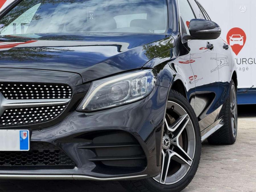 Black Mercedes-Benz C 300 2019 in Taurage, with an engine capacity of 2.00 L and mileage of 247 thousand km for 16300 €, photo 4 on AUTOMOTO.COM.LV