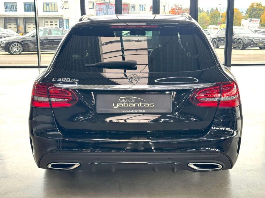 Black Mercedes-Benz C 300 2020 in Kaunas, with an engine capacity of 2.00 L and mileage of 94 thousand km for 28992 €, photo 5 on AUTOMOTO.COM.LV