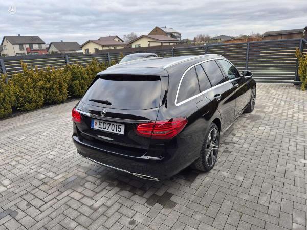Black Mercedes-Benz C 300 2020 in Klaipeda, with an engine capacity of 2.00 L and mileage of 255 thousand km for 16400 €, photo 7 on AUTOMOTO.COM.LV