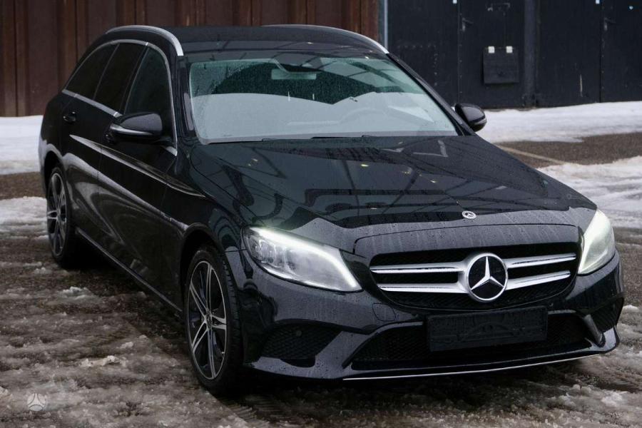 Black Mercedes-Benz C 300 2020 in Kaunas, with an engine capacity of 1.95 L and mileage of 224 thousand km for 16300 €, photo 1 on AUTOMOTO.COM.LV