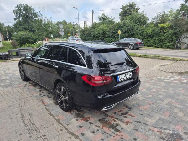 Black Mercedes-Benz C 300 2020 in Ogre, with an engine capacity of 2.00 L and mileage of 245 thousand km for 17500 €, photo 3 on AUTOMOTO.COM.LV