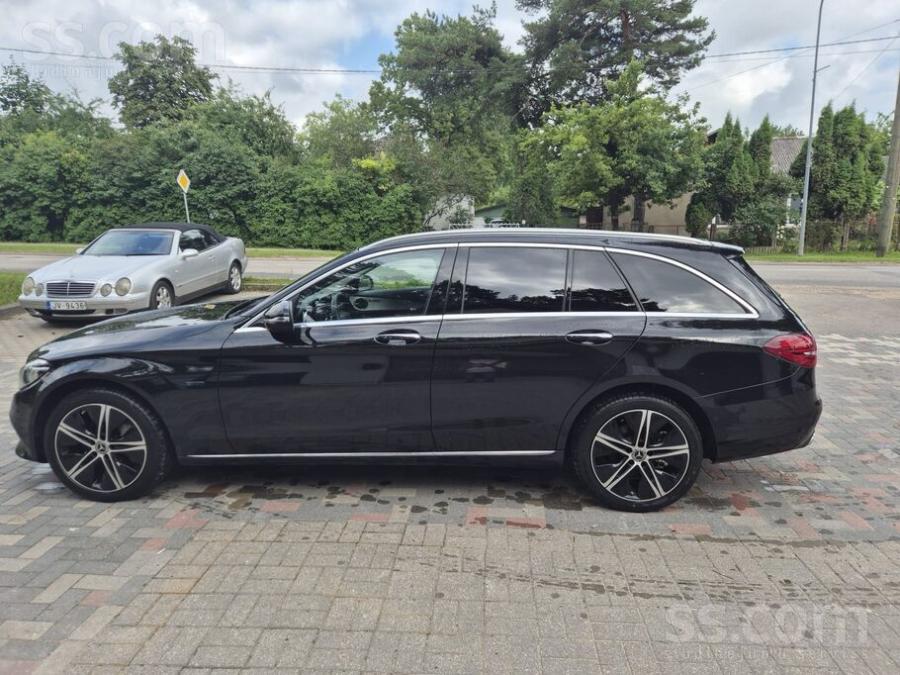 Black Mercedes-Benz C 300 2020 in Ogre, with an engine capacity of 2.00 L and mileage of 245 thousand km for 17500 €, photo 5 on AUTOMOTO.COM.LV