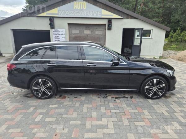 Black Mercedes-Benz C 300 2020 in Ogre, with an engine capacity of 2.00 L and mileage of 245 thousand km for 17500 €, photo 6 on AUTOMOTO.COM.LV