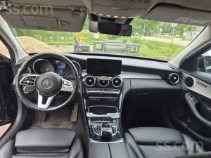Black Mercedes-Benz C 300 2020 in Ogre, with an engine capacity of 2.00 L and mileage of 245 thousand km for 17500 €, photo 13 on AUTOMOTO.COM.LV