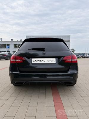 Black Mercedes-Benz C 300 2020 in Riga, with an engine capacity of 2.00 L and mileage of 194 thousand km for 21099 €, photo 6 on AUTOMOTO.COM.LV