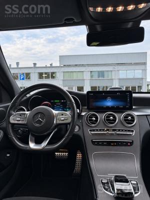 Black Mercedes-Benz C 300 2020 in Riga, with an engine capacity of 2.00 L and mileage of 194 thousand km for 21099 €, photo 21 on AUTOMOTO.COM.LV