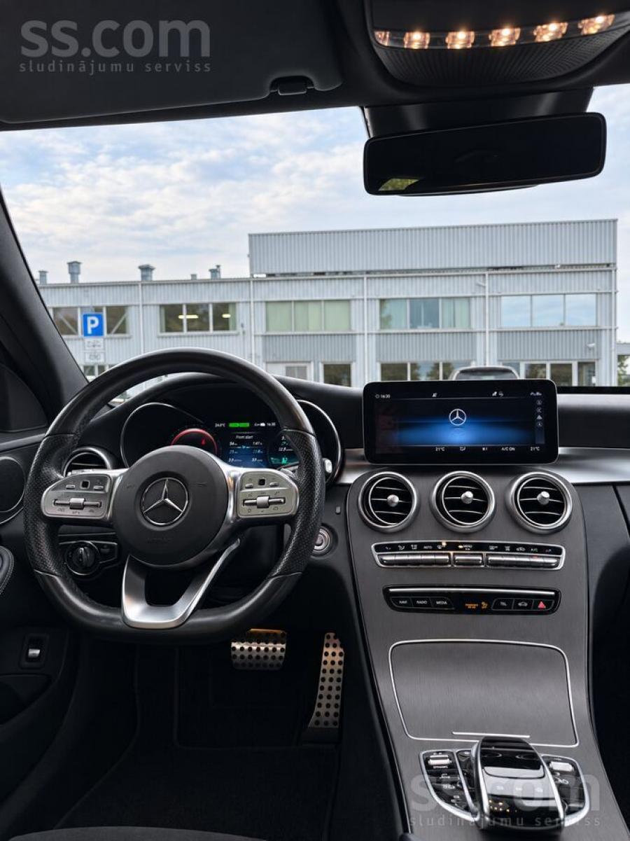 Black Mercedes-Benz C 300 2020 in Riga, with an engine capacity of 2.00 L and mileage of 194 thousand km for 21099 €, photo 21 on AUTOMOTO.COM.LV