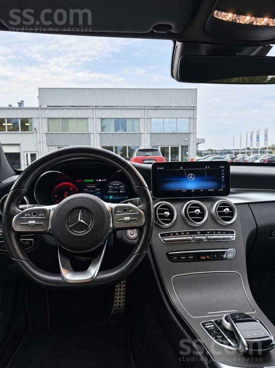 Black Mercedes-Benz C 300 2020 in Riga, with an engine capacity of 2.00 L and mileage of 194 thousand km for 21099 €, photo 22 on AUTOMOTO.COM.LV