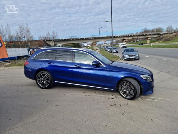 Blue Mercedes-Benz C 300 2020 in Kaunas, with an engine capacity of 2.00 L and mileage of 313 thousand km for 17000 €, photo 5 on AUTOMOTO.COM.LV