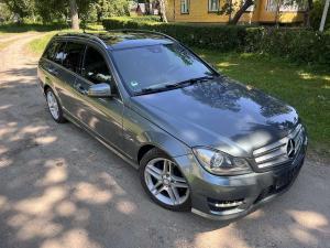 Green Mercedes-Benz C 300 2011 in Utena, with an engine capacity of 2.99 L and mileage of 250 thousand km for 6999 €, photo 3 on AUTOMOTO.COM.LV
