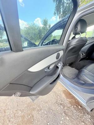 Grey Mercedes-Benz C 300 2016 in Kaunas, with an engine capacity of 1.99 L and mileage of 155 thousand km for 13500 €, photo 17 on AUTOMOTO.COM.LV