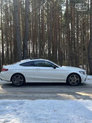 White Mercedes-Benz C 300 2021 in Vilnius, with an engine capacity of 2.00 L and mileage of 93 thousand km for 31500 €, photo 8 on AUTOMOTO.COM.LV