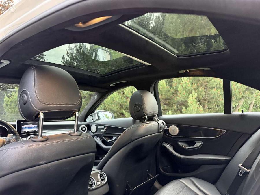 White Mercedes-Benz C 300 2017 in Vilnius, with an engine capacity of 1.99 L and mileage of 155 thousand km for 13900 €, photo 11 on AUTOMOTO.COM.LV