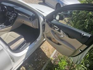 White Mercedes-Benz C 300 2017 in Vilnius, with an engine capacity of 2.00 L and mileage of 135 thousand km for 9900 €, photo 14 on AUTOMOTO.COM.LV