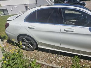 White Mercedes-Benz C 300 2017 in Vilnius, with an engine capacity of 2.00 L and mileage of 135 thousand km for 9900 €, photo 16 on AUTOMOTO.COM.LV