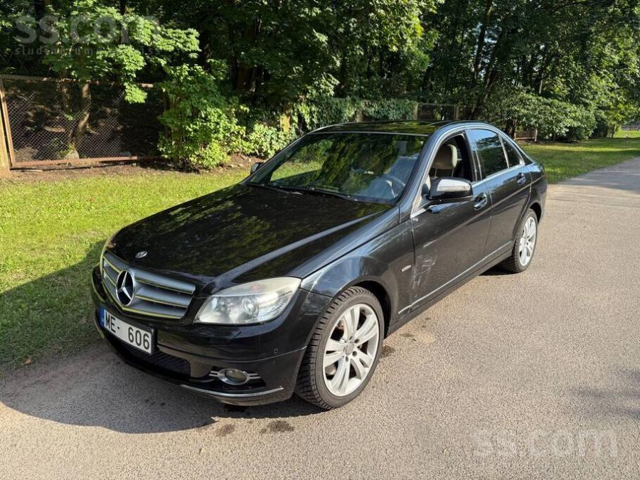 Black Mercedes-Benz c-320 2008 in Riga, with an engine capacity of 3.00 L and mileage of 245 thousand km for 5100 €, photo 2 on AUTOMOTO.COM.LV