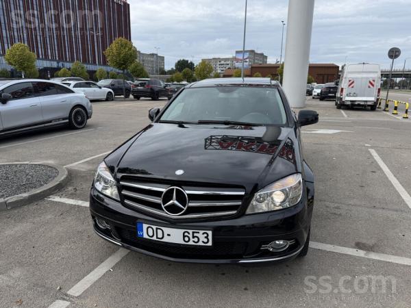 Black Mercedes-Benz c-320 2008 in Riga, with an engine capacity of 3.00 L and mileage of 392 thousand km for 4995 €, photo 1 on AUTOMOTO.COM.LV