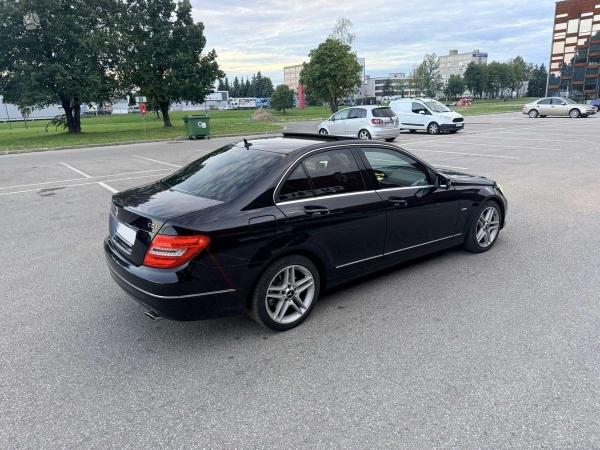 Black Mercedes-Benz C 350 2011 in Kaunas, with an engine capacity of 2.99 L and mileage of 183 thousand km for 11300 €, photo 11 on AUTOMOTO.COM.LV