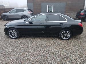 Black Mercedes-Benz C 350 2015 in Klaipeda, with an engine capacity of 2.00 L and mileage of 178 thousand km for 16290 €, photo 5 on AUTOMOTO.COM.LV