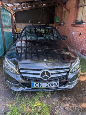 Black Mercedes-Benz C 350 2015 in Riga, with an engine capacity of 2.00 L and mileage of 188 thousand km for 9700 €, photo  on AUTOMOTO.COM.LV